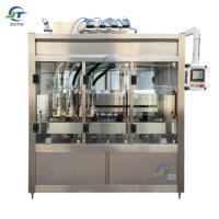 China Automatic 4 Nozzeles Thick Liquid Servopump Tracking Engine Oil Thick Oil Filling Machine With Conveyor PLC Control for sale
