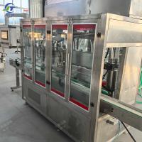 China Automatic 4 Nozzeles Thick Liquid Servopump Tracking Engine Oil Thick Oil Filling Machine With Conveyor PLC Control for sale