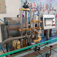 China Automatic 2 Head Volumetric Lube Oil Filling Machine for 2.5L Plastic Bottle With Conveyor for sale
