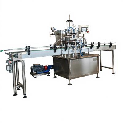 China Servo Automatic 500ml 750ml Olive Oil Bottle Filling Capping Machine With Conveyor for sale