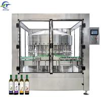 China Rotary Liquid Filling Machine 2000 BPH Glassbottle Juice Vacuum Filler Fruit Vinegar Bottle Filling for sale