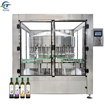 China Rotary Liquid Filling Machine 2000 BPH Glassbottle Juice Vacuum Filler Fruit Vinegar Bottle Filling for sale