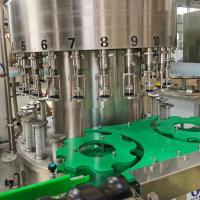 China Rotary Liquid Filling Machine 2000 BPH Glassbottle Juice Vacuum Filler Fruit Vinegar Bottle Filling for sale