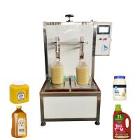 China Semi Automatic 5kg Big Oil Bottle Double Head Weighing Filling Machine for High Viscosity Liquid Pumb Pastes Filling for sale