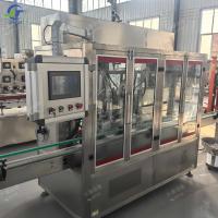 China Automatic 4-Nozzles Tracking Filling Machine for Engine Oil Bottle Viscous Liquid Heavy Fluid for sale