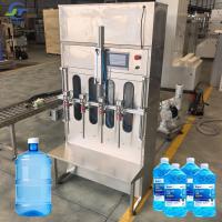 China Semi Automatic Gravity Filler with 50L Storage Tank for Mineral Water Filling for sale