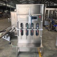 China Semi Automatic Gravity Filler with 50L Storage Tank for Mineral Water Filling for sale