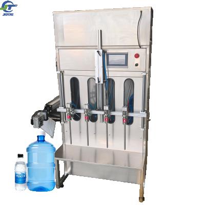 China Semi Automatic Gravity Filler Lubrication Friendly Parts Long Life for Edible Oil Wine Vinegar for sale