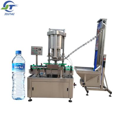 China Automatic High-Efficiency Plastic Bottle Capping Screwing Machine for Pet Cap Closing Soft Drink Beverage for sale
