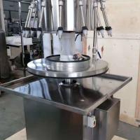 China Semi Automatic 12 Head Rotary Beverage Wine Alcohol Glass Bottle Liquid Filling Machine for sale