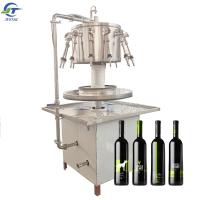 China Semi Auto Rotary Juice Fruit Vinegar Liquid Filling Machine Line for Glassbottle 1000 Bph for sale