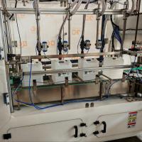 China Automatic Anti Corrosion Chemical Liquid Filling Machine 4 Nozzles 25L Detergent Pesticide HCL PET Bottle Weighing Lobe Pump for sale