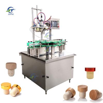 China Automatic Electric Motor T Cork Press Sealing Machine for Whiskey Vodka Glass Bottles with Conveyor Capping System for sale