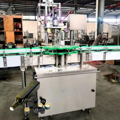 China Pneumatic T Cork Vodka Whiskey Bottle Pressing Capping Machine With Conveyor for sale