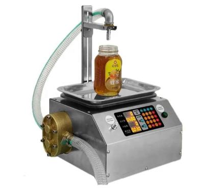 China Semi-automatic Hand Sanitizer Gel Gear Pump Face Cream Lotion Ketchup Thick Paste Filling Weighing Machine Juice Machine for sale