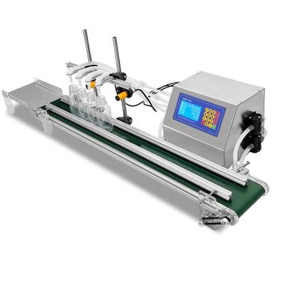 China Multi-head Automatic Small Liquid&bottle Filling Machine Energy Saving Conveyor Belt Filling Machine Juice Machine 1 Person for sale