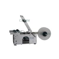 China COURM Small Semi Labeling Machine Desktop Mini Manual Bottle Labler Price Tagger Sticker Labeling Machine For Small Round Bottle for sale