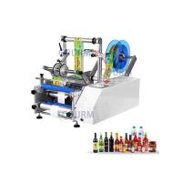 China Semi automatic round bottle self adhesive label date printing and labeling machine is suitable for cans and beverage bottles for sale