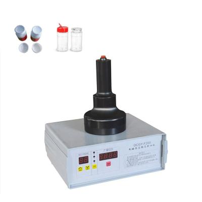 China Handheld Electromagnetic Induction Semi Auto Milk Bottle Sealing Machine Aluminium Foil Manual Portable Induction Sealer for sale
