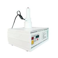 China Manual Mini Lid Magnetic Induction Aluminum Foil sealing machine for glass plastic bottle for sale