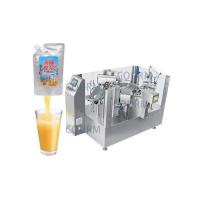 China Automatic rotary vertical feeder for pre made bags of juice milk ketchup high viscosity liquid filling and packaging machine for sale