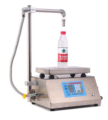 China small semi auto weighing liquid glass bottle Edible vegetable oil sunflower mustard olive essential palm oil filling machine for sale