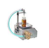 China CSY-15 CNC automatic sesame paste edible oil glue cosmetics face cream sticky honey quantitative weighing filling machine for sale