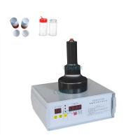 China Mini Heat Manual Bottle Magnetic Induction Foil Sealing Machine Aluminum for Plastic Bottle Paper 25pcs/min for sale