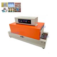 China Automatic desktop PVC POF PP plastic film tunnel food books tableware cosmetics box heat shrink packaging machine for sale