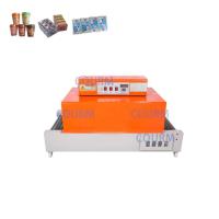 China Small automatic mobile phone box film juice box mineral water plastic bottle PVC heat shrink film tunnel wrapping machine for sale