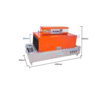 China Small automatic mobile phone box film juice box mineral water plastic bottle PVC heat shrink film tunnel wrapping machine for sale