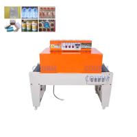 China Small desktop automatic shoebox instant noodle box Coke bottle milk tea paper cup book film shrink packaging machine for sale