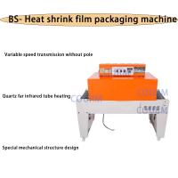 China Small desktop automatic shoebox instant noodle box Coke bottle milk tea paper cup book film shrink packaging machine for sale