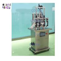 China COURM Automatic perfume cosmetics essence oil glass bottle wine juice beverage water four spout vacuum liquid filling machine for sale