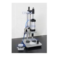 China Vertical pneumatic automatic perfume lotion Essence eye drops cooling oil bottle capping stainless steel capping machine for sale