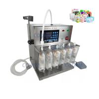 China Semi automatic soy milk butter soy sauce vinegar edible oil high temperature resistant 6-head nozzle bag filling machine for sale