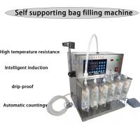 China Semi automatic soy milk butter soy sauce vinegar edible oil high temperature resistant 6-head nozzle bag filling machine for sale