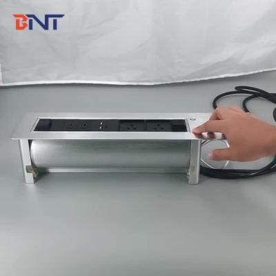 China BNT smart wireless phone charger table motorized flip up jack socket for sale