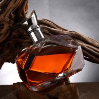 China 350ml Hand Carved Fire Polish Crystal Shape Glass Whiskey Bottle With Stopper Handmade for sale
