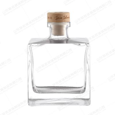 China Wine Acceptable Customer's Logo 500ml Glass Square Vodka Whiskey Bottle with Cork Lids for sale