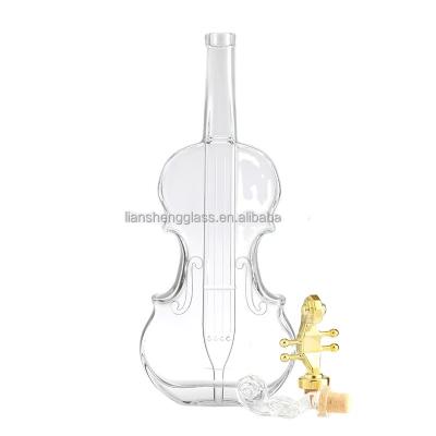 China 350ml 500ml 750ml 1000ml Guitar Shape Glass Bottles With Gold Lid For Whiskey Liquor for sale