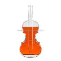 China 350ml 500ml 750ml 1000ml Guitar Shape Glass Bottles With Gold Lid For Whiskey Liquor for sale