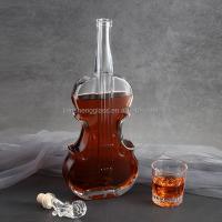 China 350ml 500ml 750ml 1000ml Guitar Shape Glass Bottles With Gold Lid For Whiskey Liquor for sale