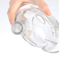 China Glass Liquor Wine Whisky Bottle With Cork Lid Transparent Round Empty and Custom Size for sale