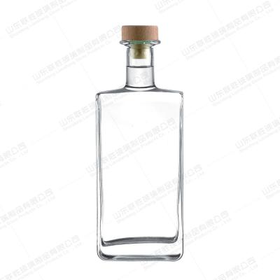 China Glass Collar 250ml 500ml 750ml Flat Whisky Bottle with Screw Cap and Customized Color for sale