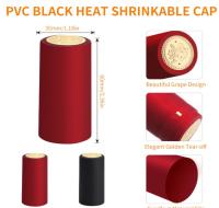 China Custom Wine Bottle Cork With Black Plastic Top PVC Heat Shrink Capsule Bottle Seal for sale
