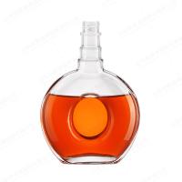 China Customized Color 500ml 700ml 750ml Flat Round Glass Bottle for Beverage Packaging for sale
