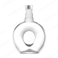 China Customized Color 500ml 700ml 750ml Flat Round Glass Bottle for Beverage Packaging for sale