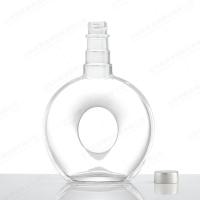 China Customized Color 500ml 700ml 750ml Flat Round Glass Bottle for Beverage Packaging for sale
