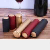 China Customized Bottle Color Heat Shrink PVC Embossed Wine Bottle Cap with Bottle Stopper for sale